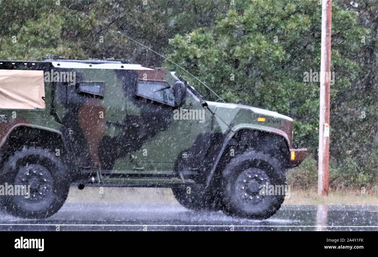 Soldiers drive a Joint Light Tactical Vehicle (JLTV) through the ...
