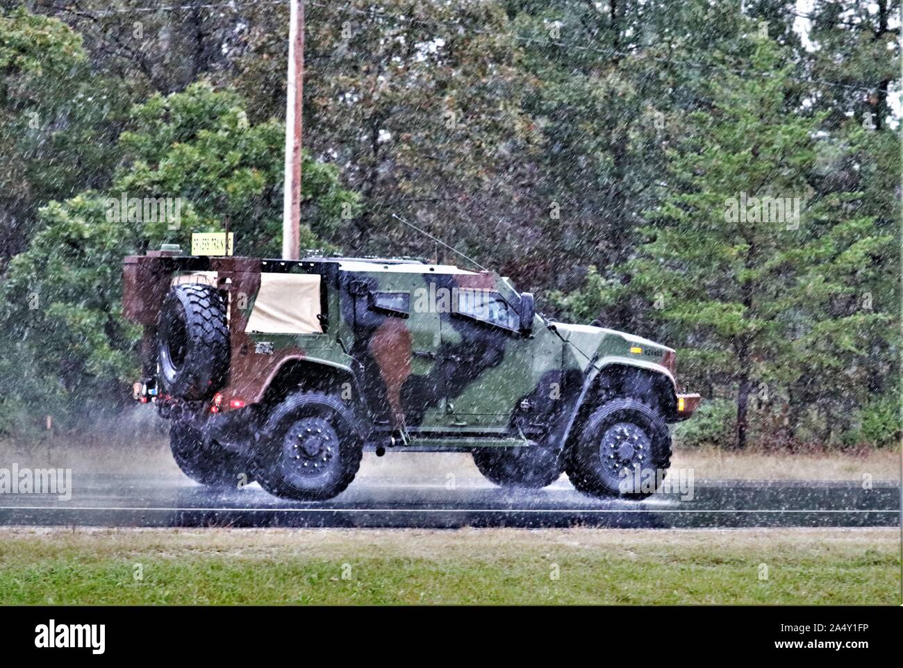 Soldiers drive a Joint Light Tactical Vehicle (JLTV) through the ...