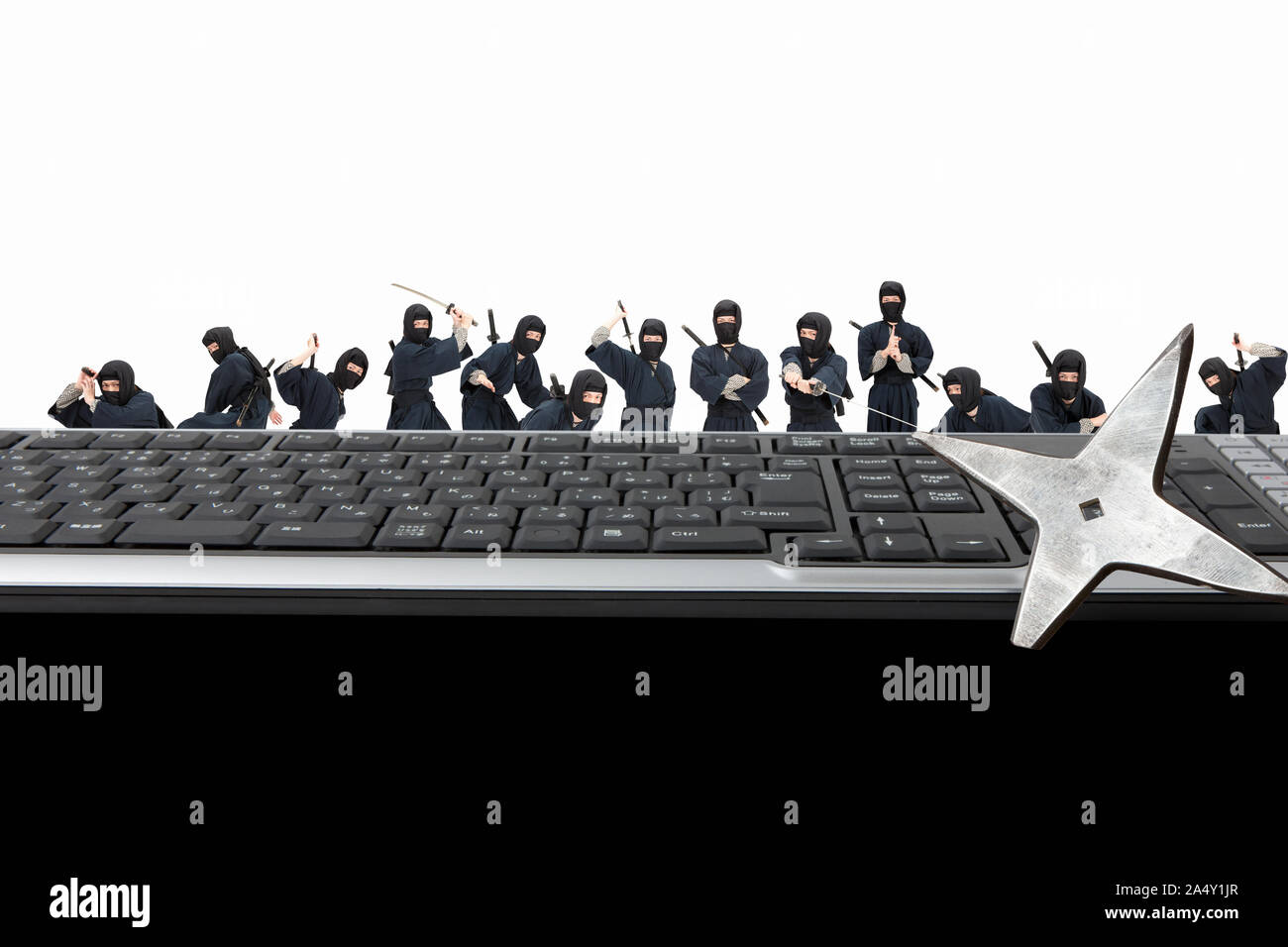 Keyboard and ninja Stock Photo - Alamy