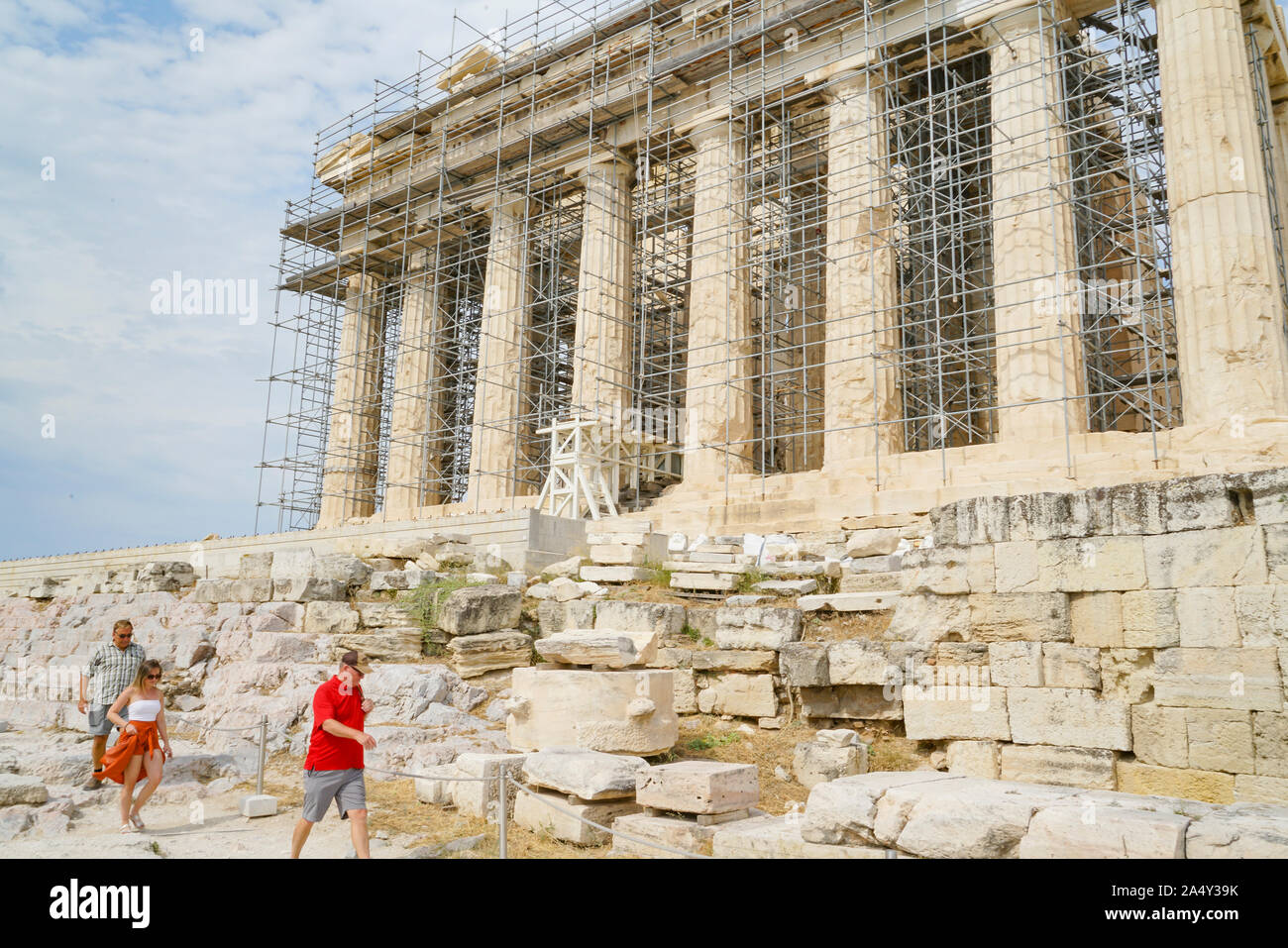 Athens Greece July 16 2019;tourists walking around Acropolis under restoration and surrounded by ...