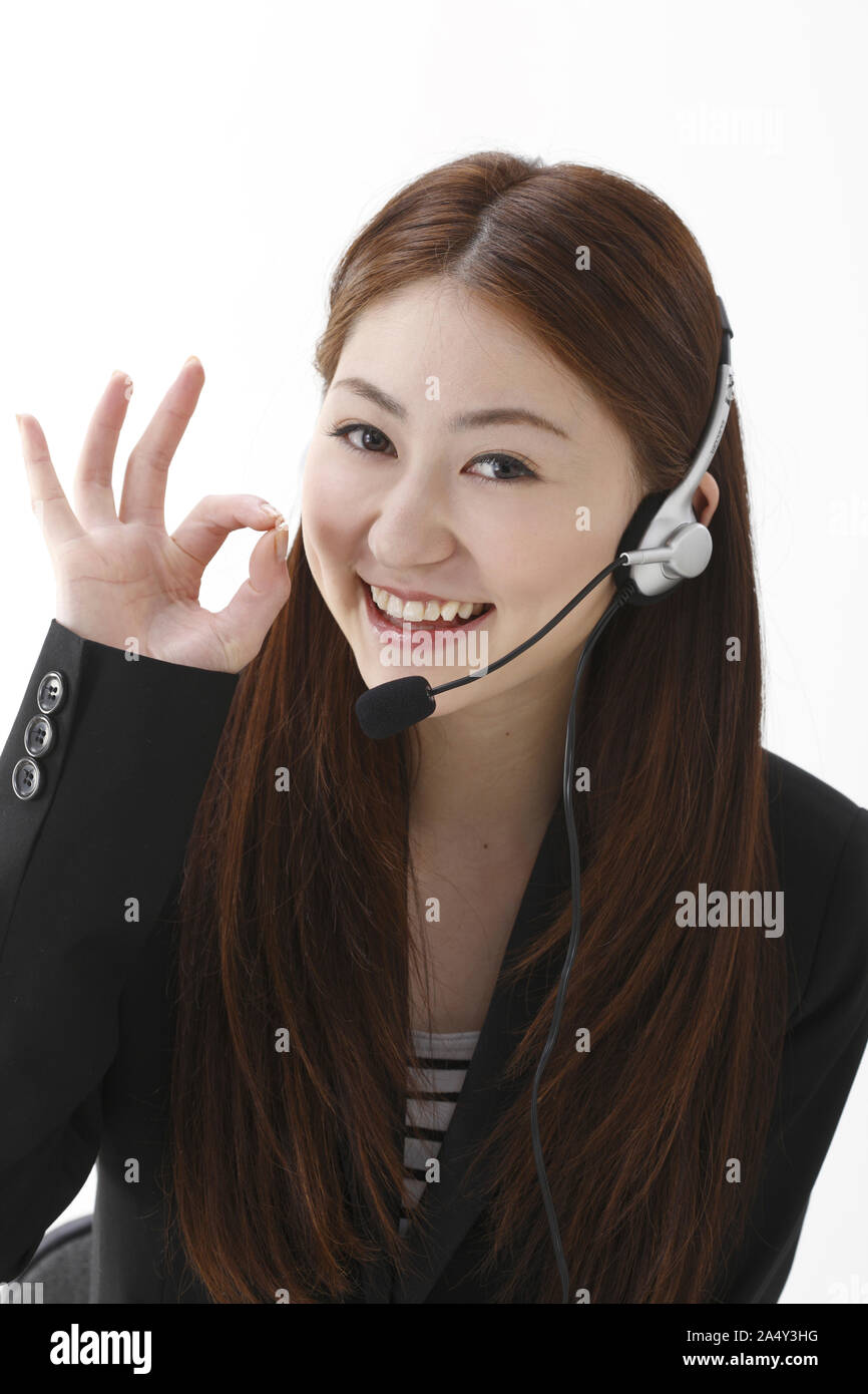 A telephone operator ok sign with hand Stock Photo - Alamy