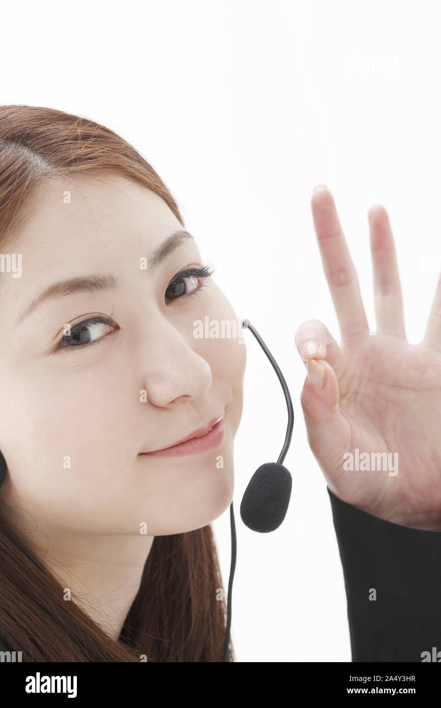 A telephone operator ok sign with hand Stock Photo - Alamy
