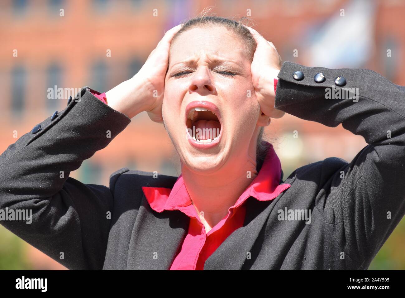 An Adult Business Woman Yelling Stock Photo - Alamy