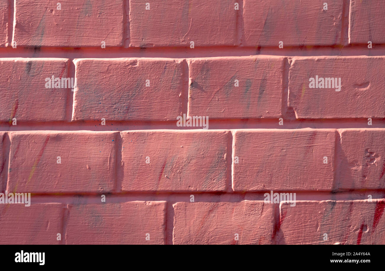close-up of a facade of bricks and mortar with pink color Stock Photo ...