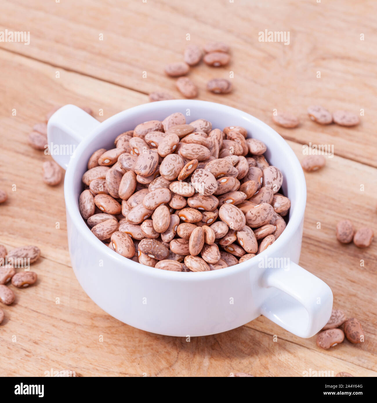 Brown pinto beans in the bowl and brown pinto beans background Stock ...