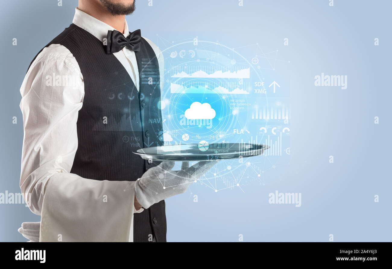 Elegant young waiter serving cloud technology concept Stock Photo - Alamy