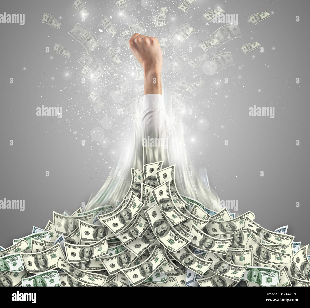 Hand bursting out from a huge money pile Stock Photo - Alamy