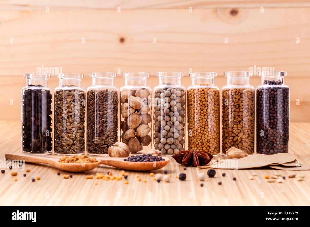 Assorted of spice bottles condiment black pepper ,white pepper, black ...