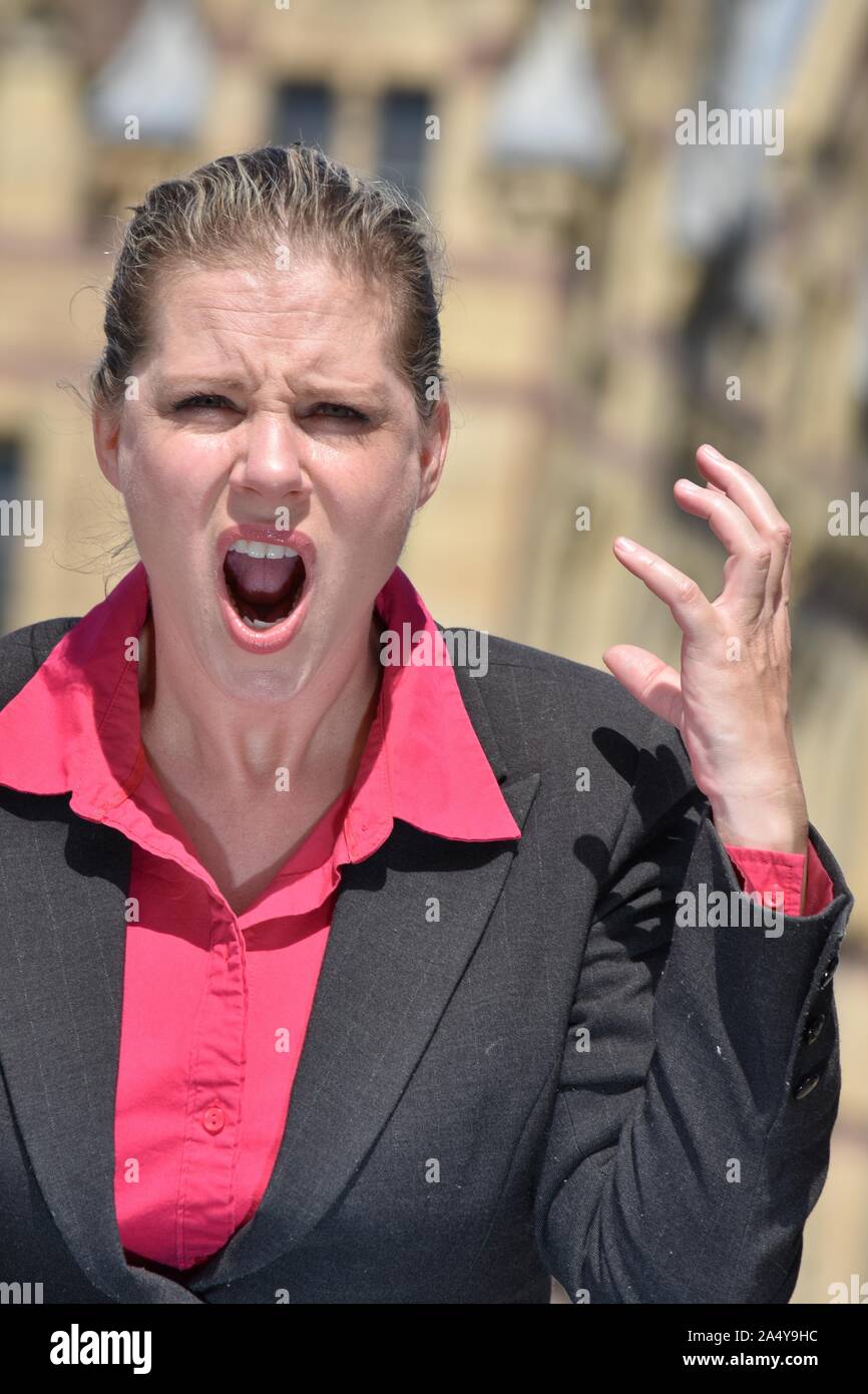 Adult Business Woman And Anger Wearing Suit Stock Photo - Alamy