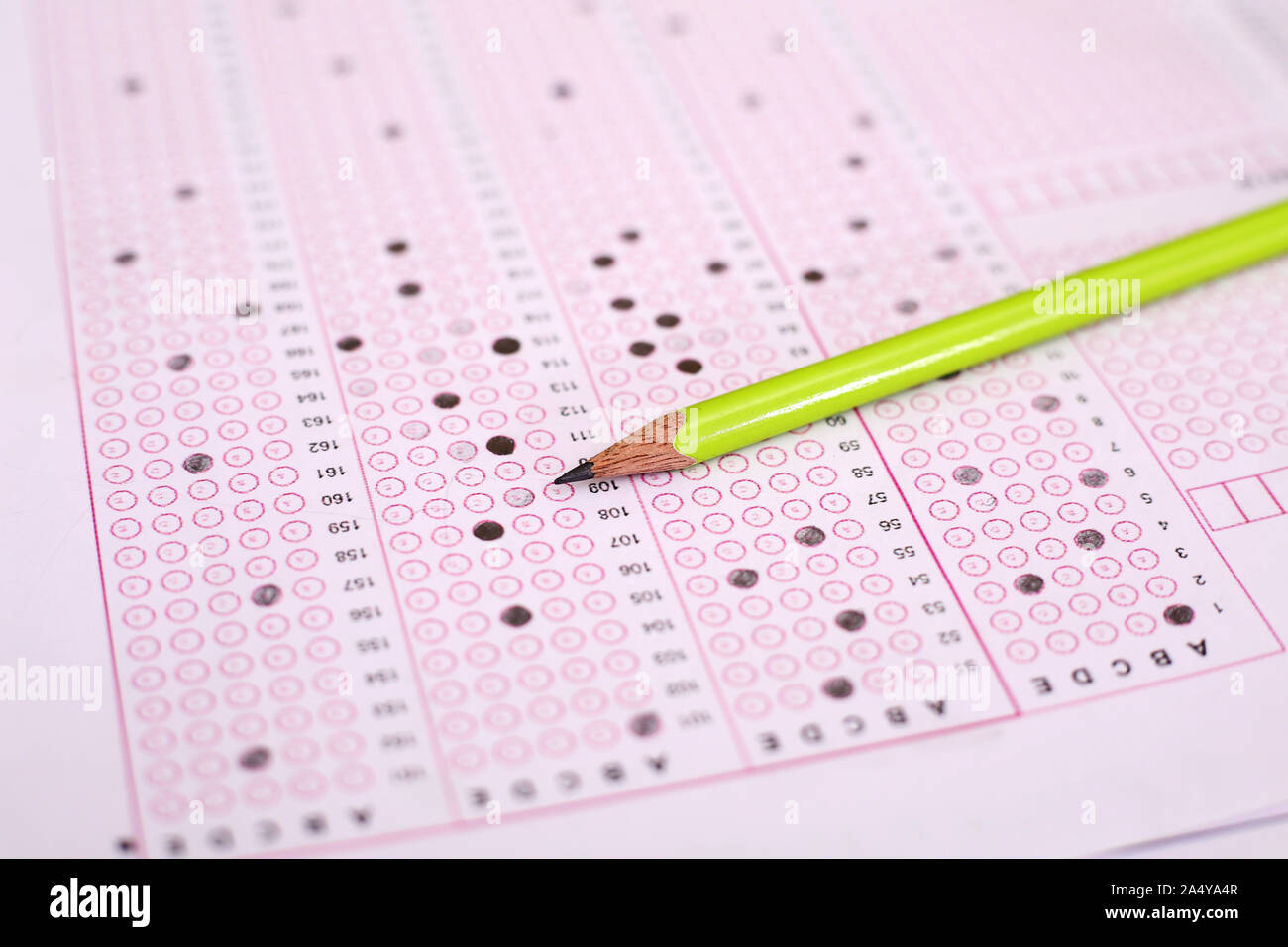 Picture of a man filling the OMR sheet Stock Photo - Alamy