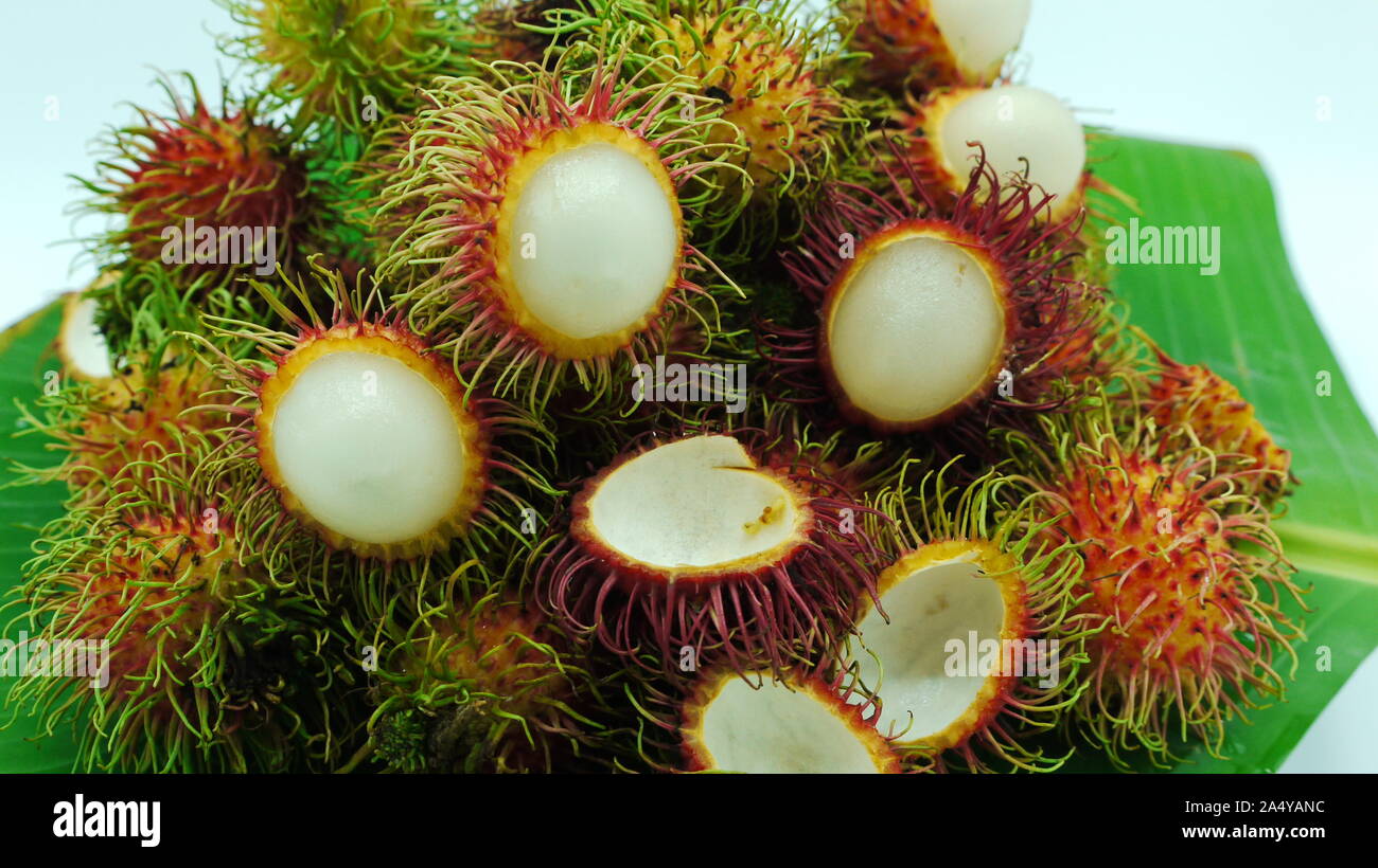 Rambutan on white background with blender fruit open and smoothie ...