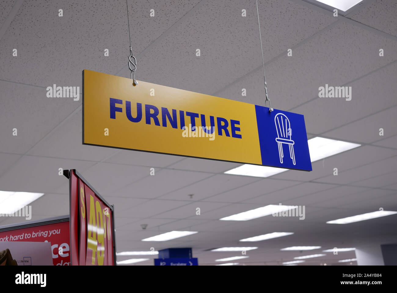 Motion of furniture sign on home equipment section inside Walmart store ...