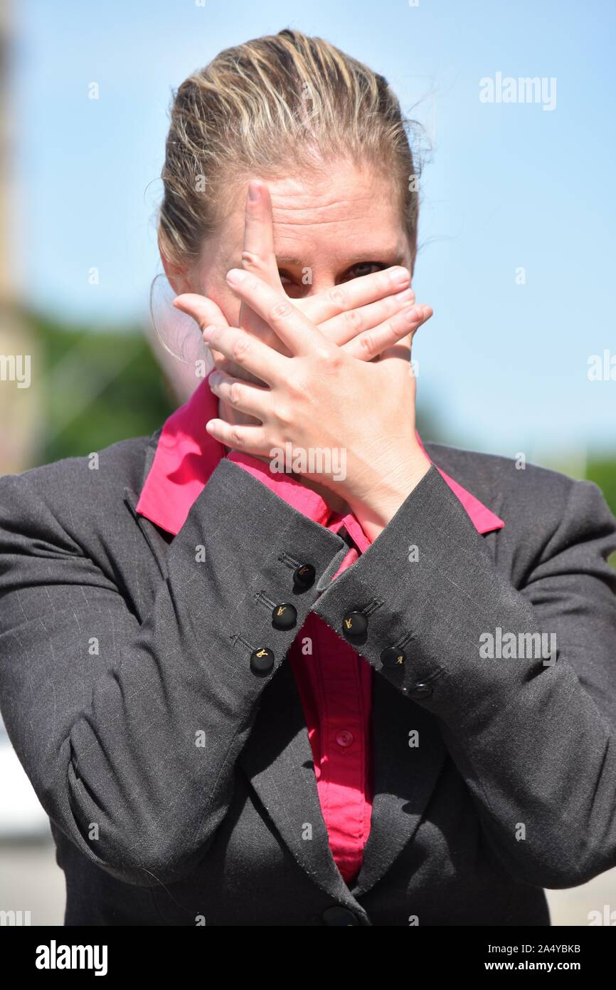 An Ashamed Adult Blonde Person Stock Photo - Alamy