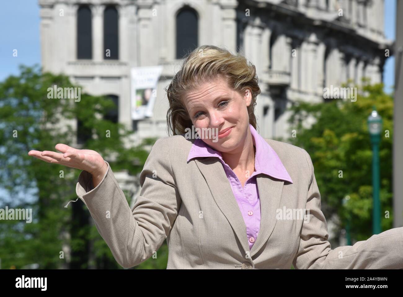 An Undecided Business Woman Wearing Suit Stock Photo - Alamy