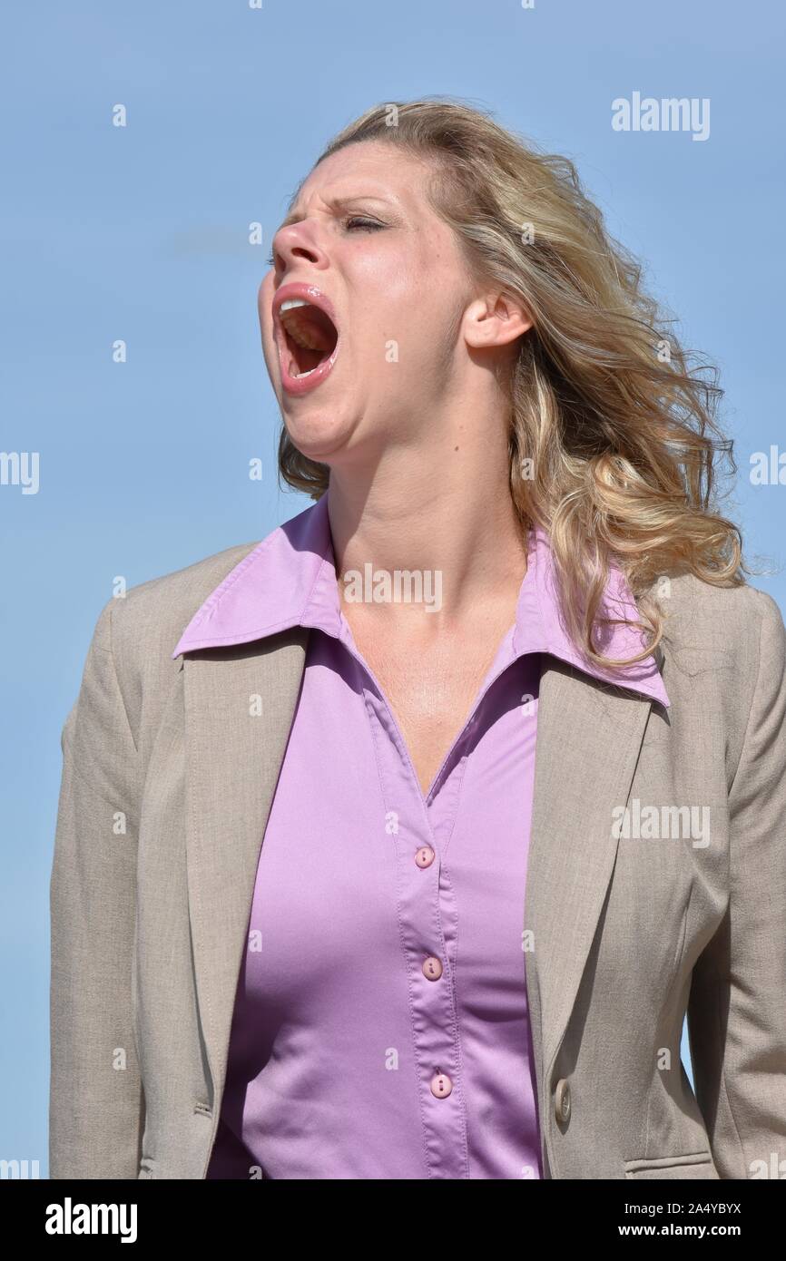 An Adult Blonde Business Woman Shouting Stock Photo - Alamy