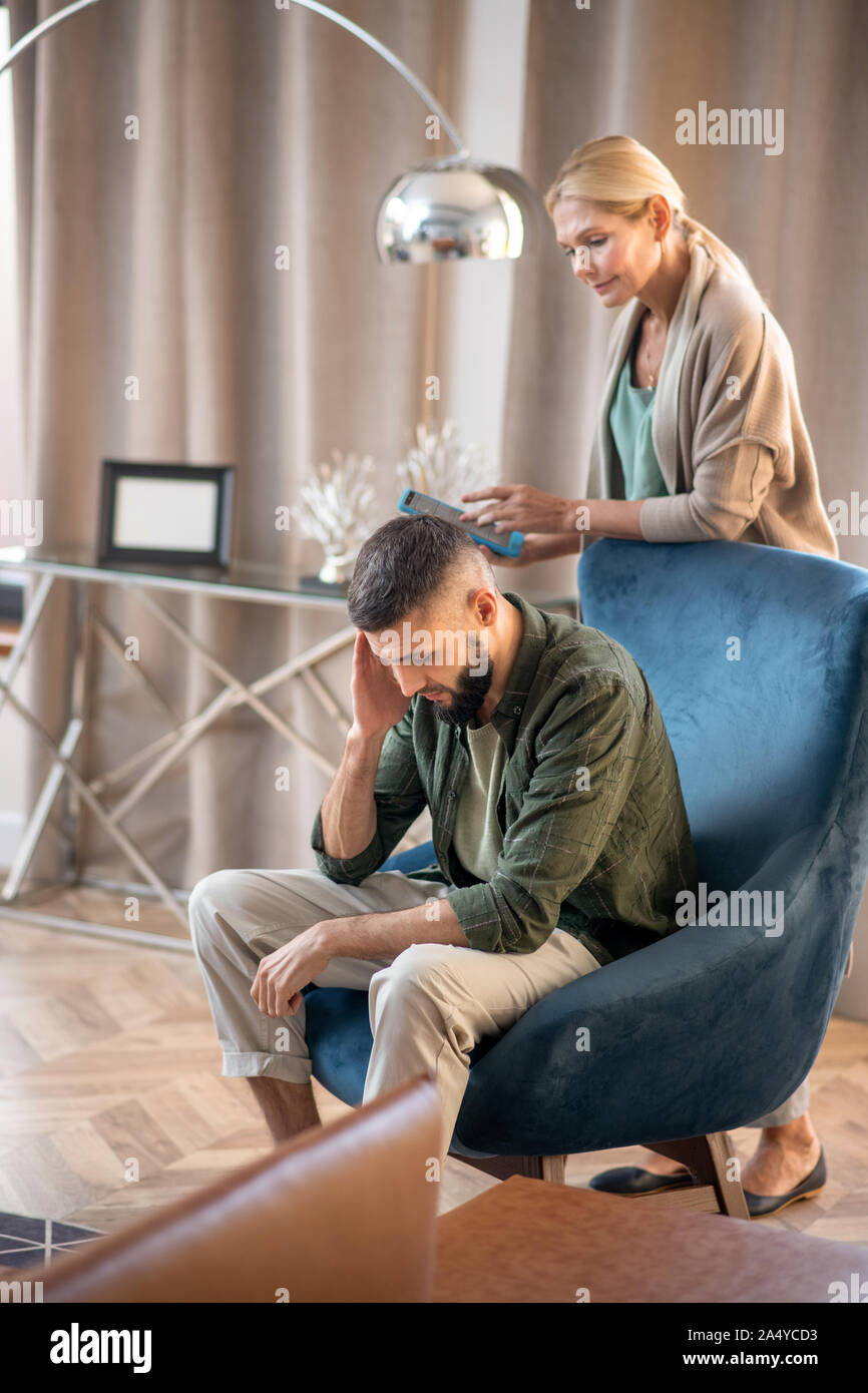 Handsome depressed man talking hi-res stock photography and images - Alamy