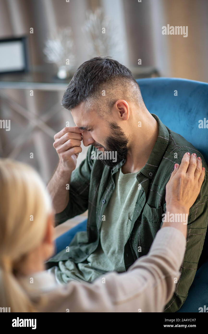 Man supporting woman having hi-res stock photography and images - Alamy