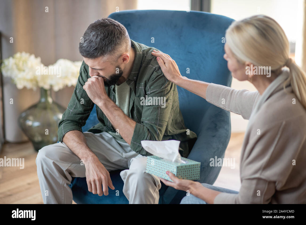 Bearded man crying while thinking about stressful childhood Stock Photo ...