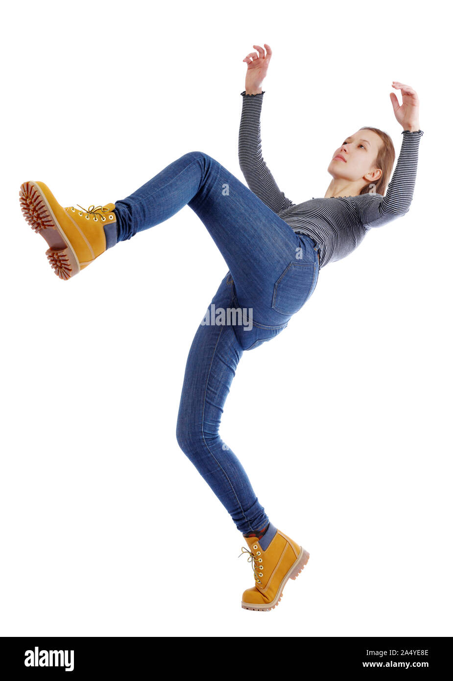 Balancing young woman. or dodge falling woman. Rear view people ...