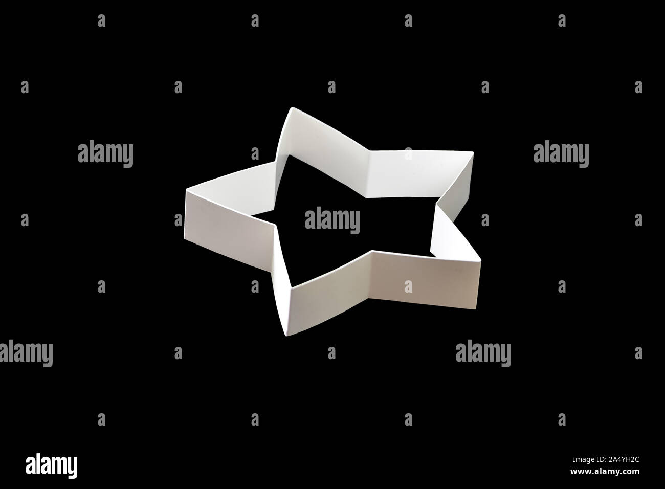 Star symbol, hand made from cardboard, the concept of a positive or ...