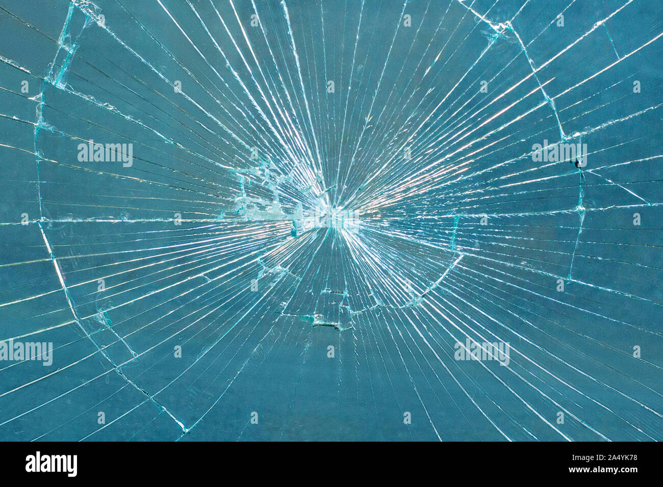 Broken Glass Pane. Smashed Blue Glass Stock Photo - Alamy