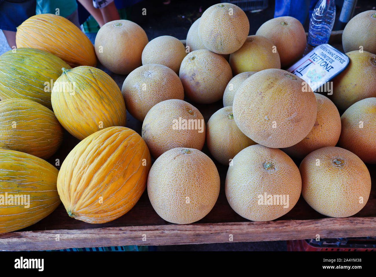 A selection of melons on a market stall Stock Photo - Alamy