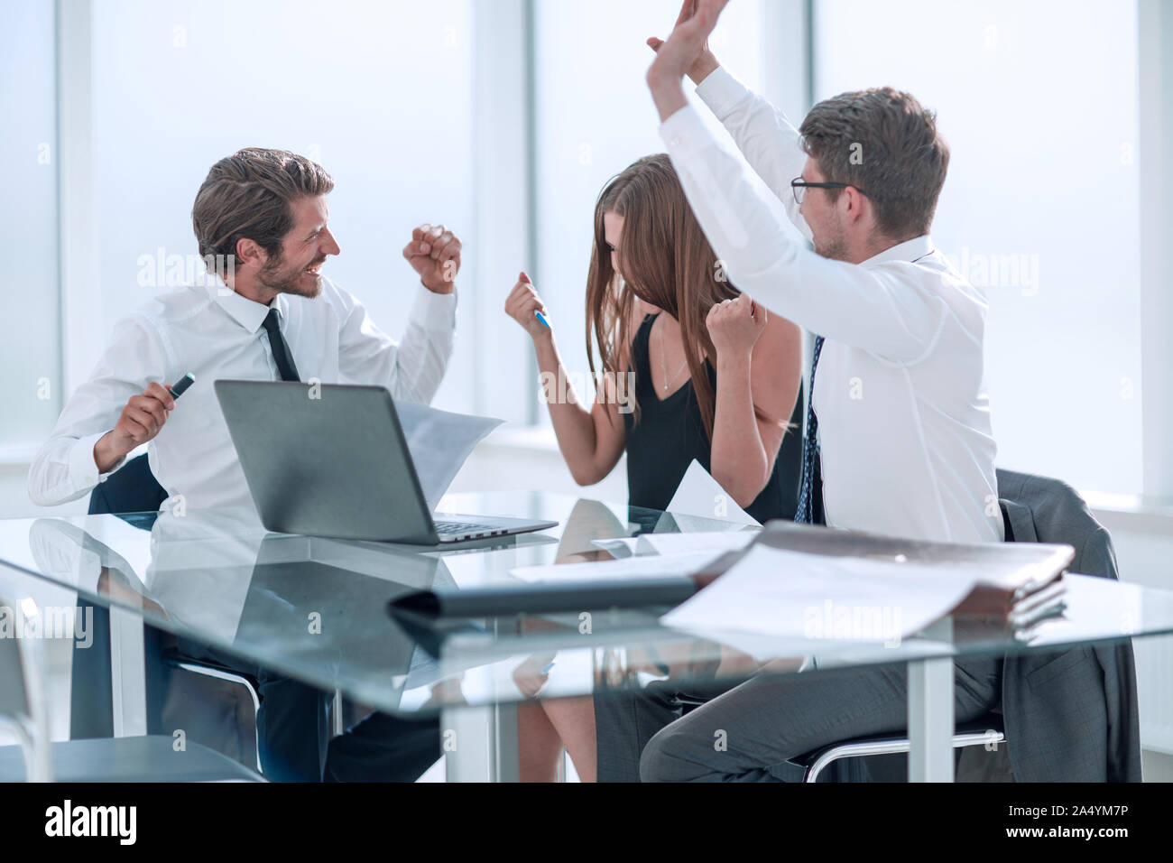 happy employees showing the success of teamwork Stock Photo - Alamy