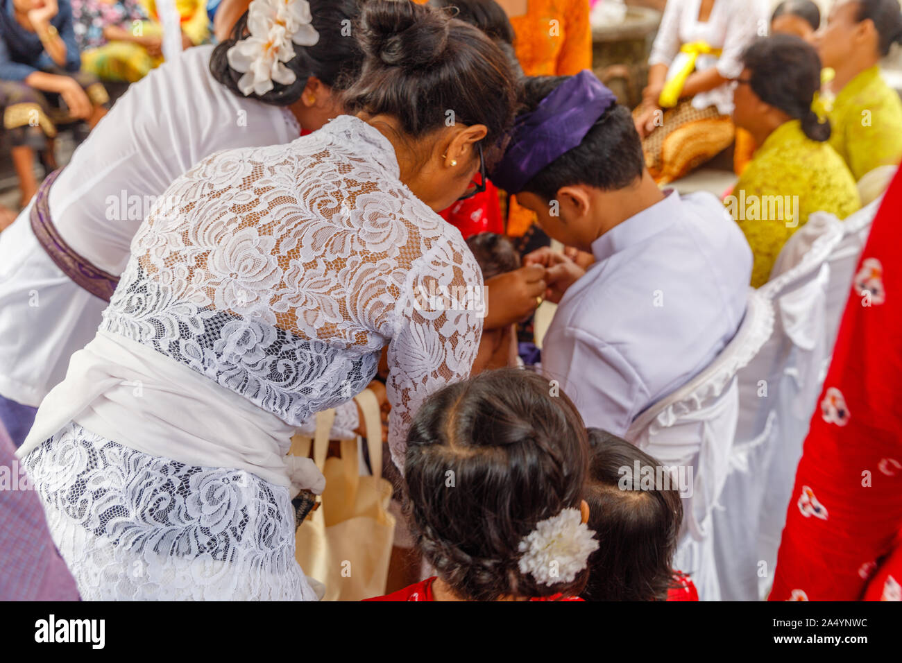 Balinese Hindu during religious ceremony in family temple (Sanggah ...