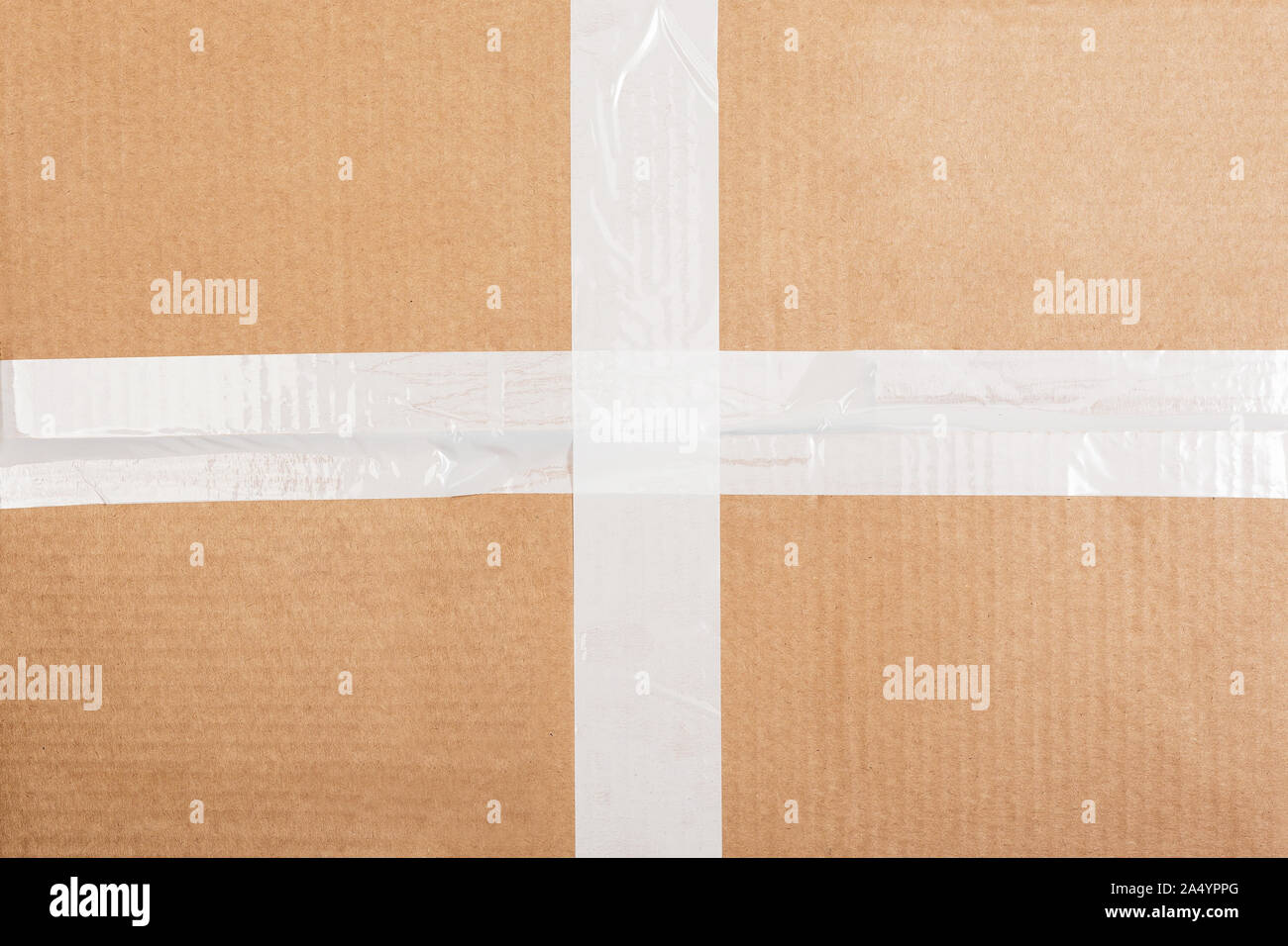 Cardboard box background with white sticky tape. Box packaging ...