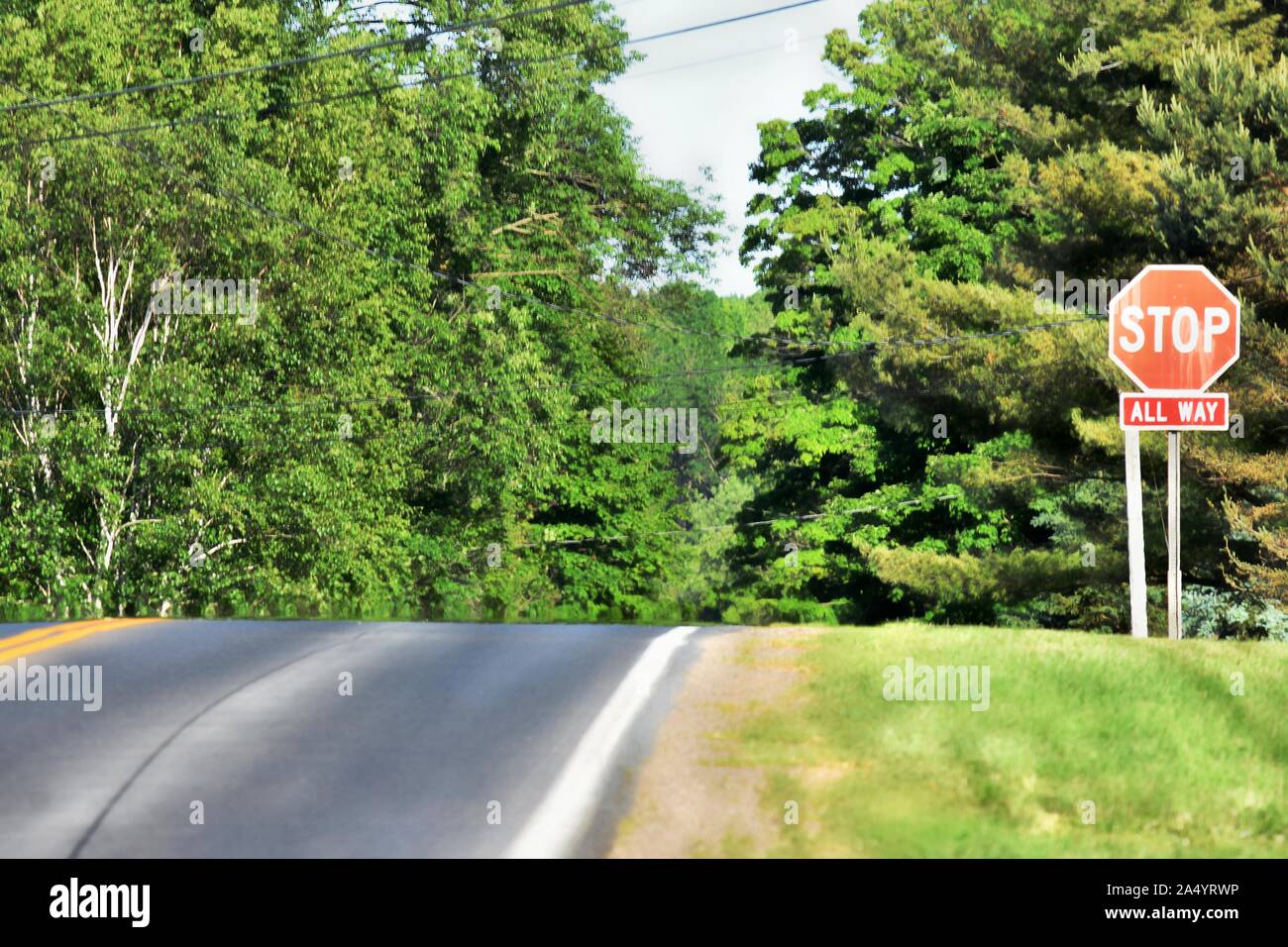 Rural Road And Stop Sign Stock Photo - Alamy