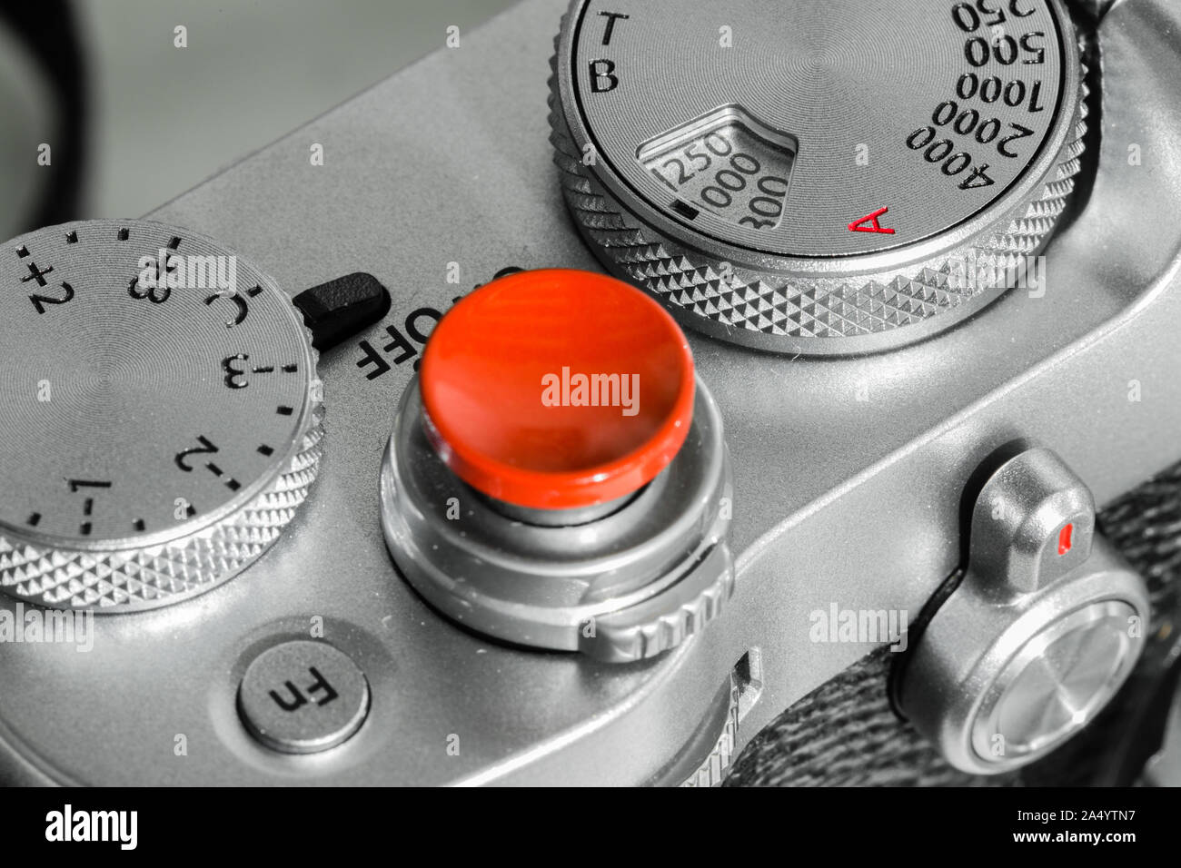 silver color camera shutter button and dial Stock Photo - Alamy