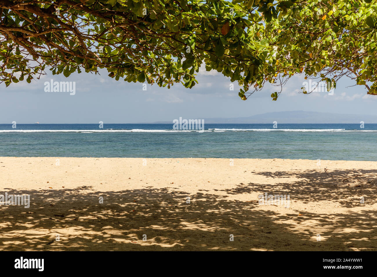 Views of Sanur beach, sand, ocean, trees. Bali, Indonesia Stock Photo ...