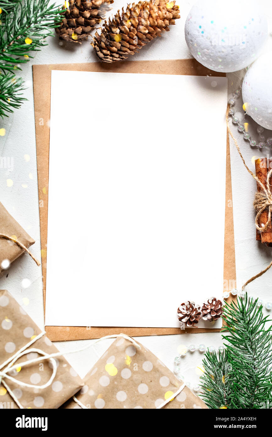 Merry Christmas and happy New year. Mockup with postcard and branches ...