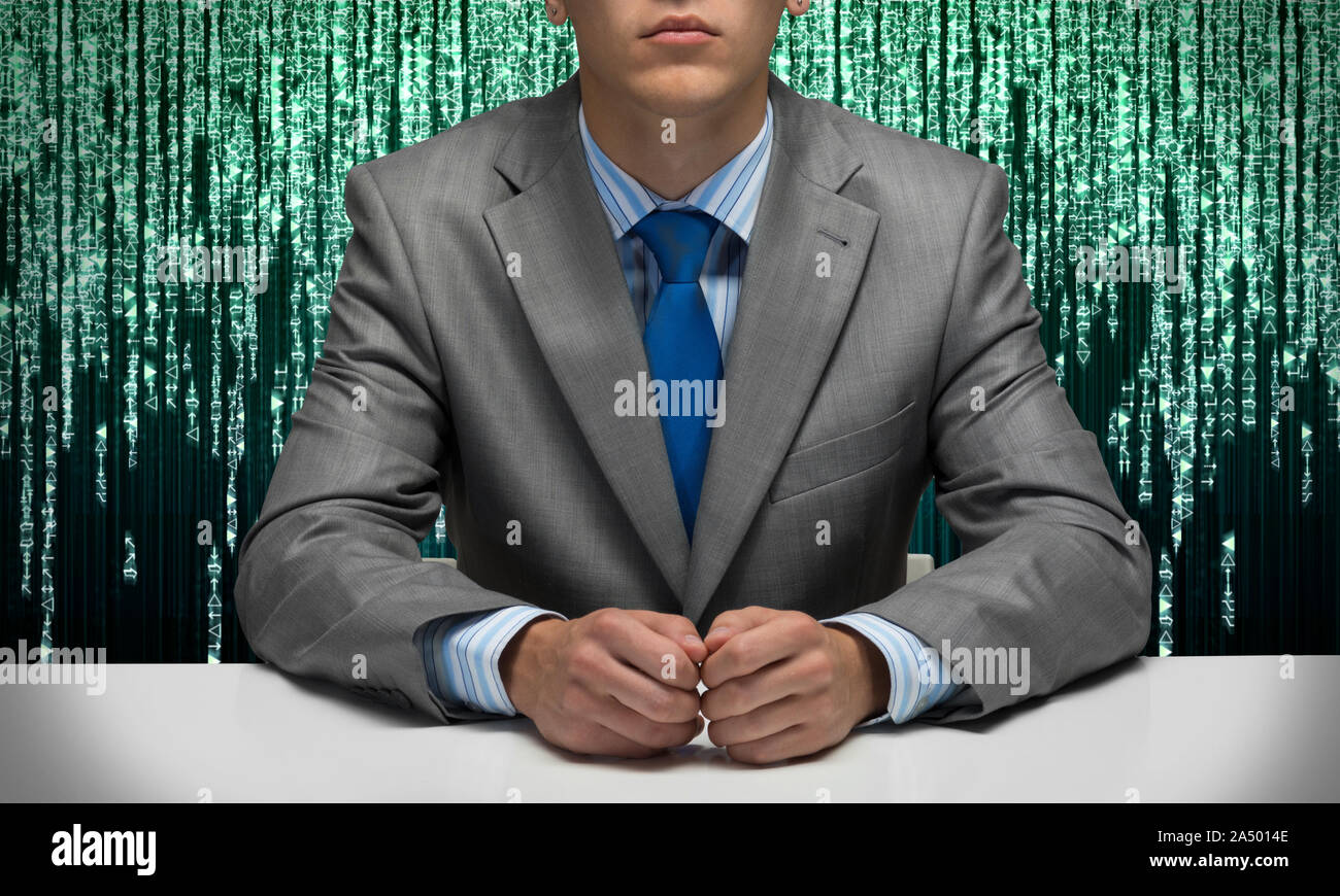 Man with folded hands sitting at desk. Internet manager without face in ...