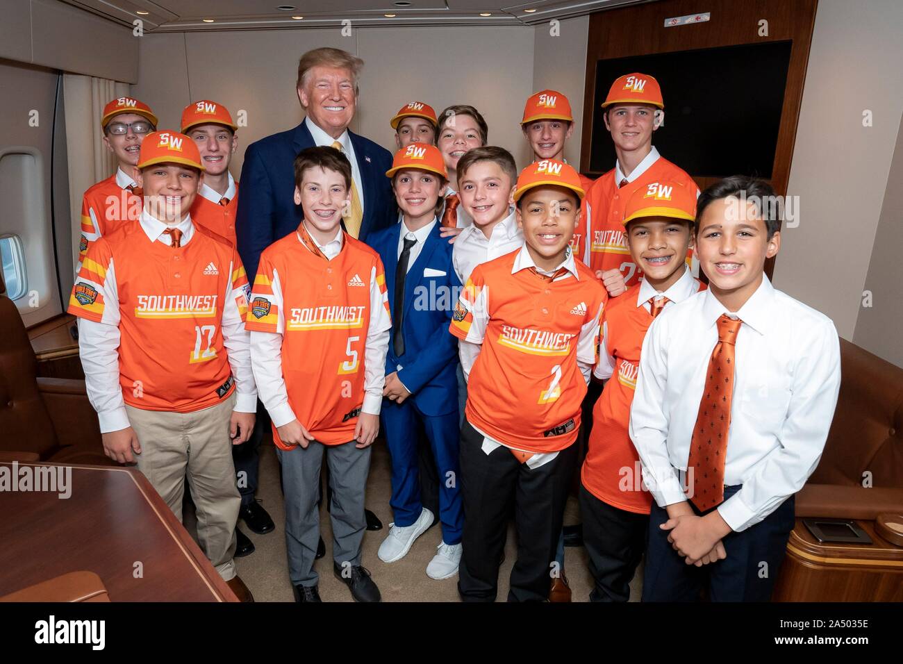 U.S President Donald Trump poses with members of the Little League ...