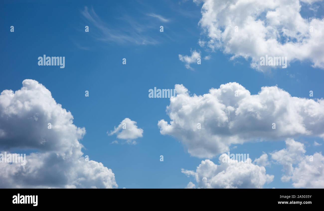 blue sky with flying white light clouds Stock Photo - Alamy
