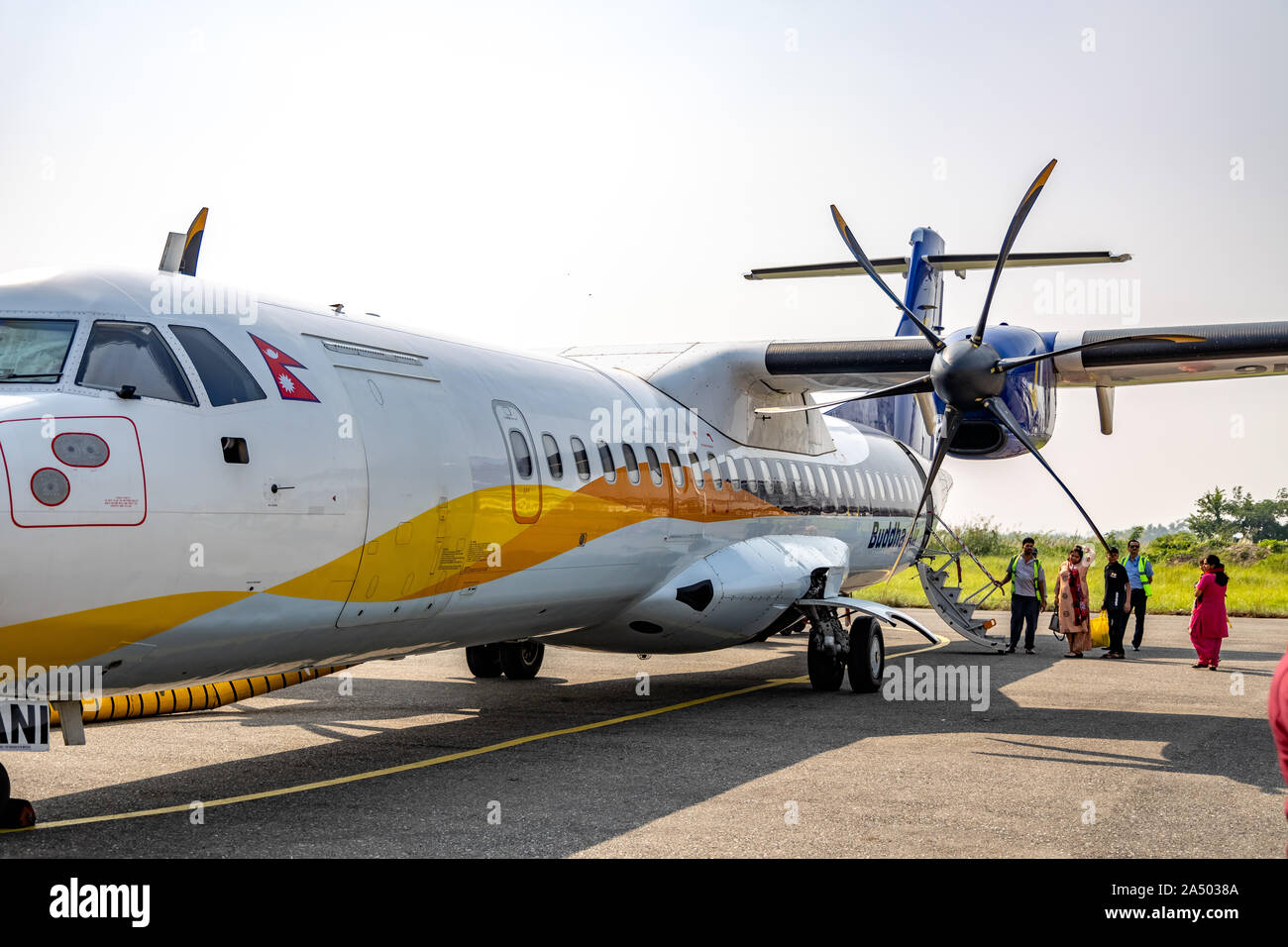 People boarding a plane Stock Photo - Alamy