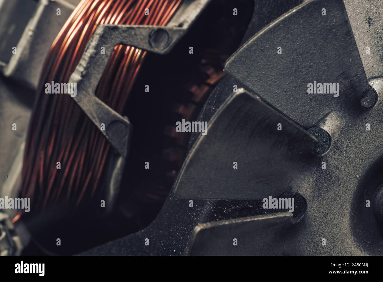 Close up old electric motor impeller on a dark background. Macro view ...