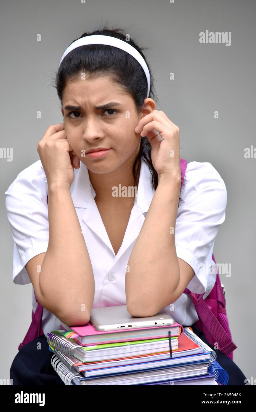 Cute Female Student And Confusion Wearing Uniform Stock Photo - Alamy