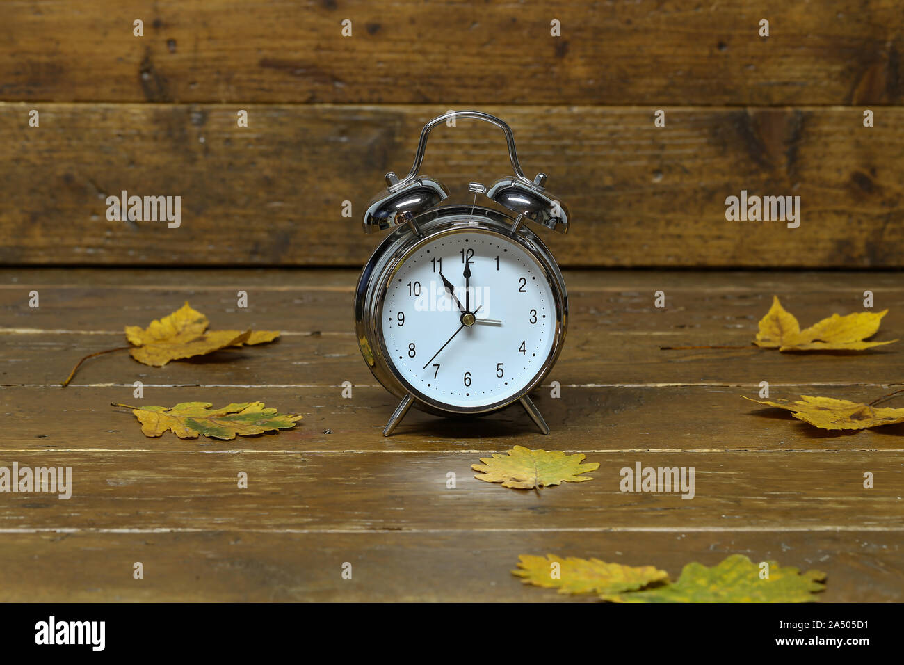 Autumn still life with an old alarm clock Stock Photo - Alamy