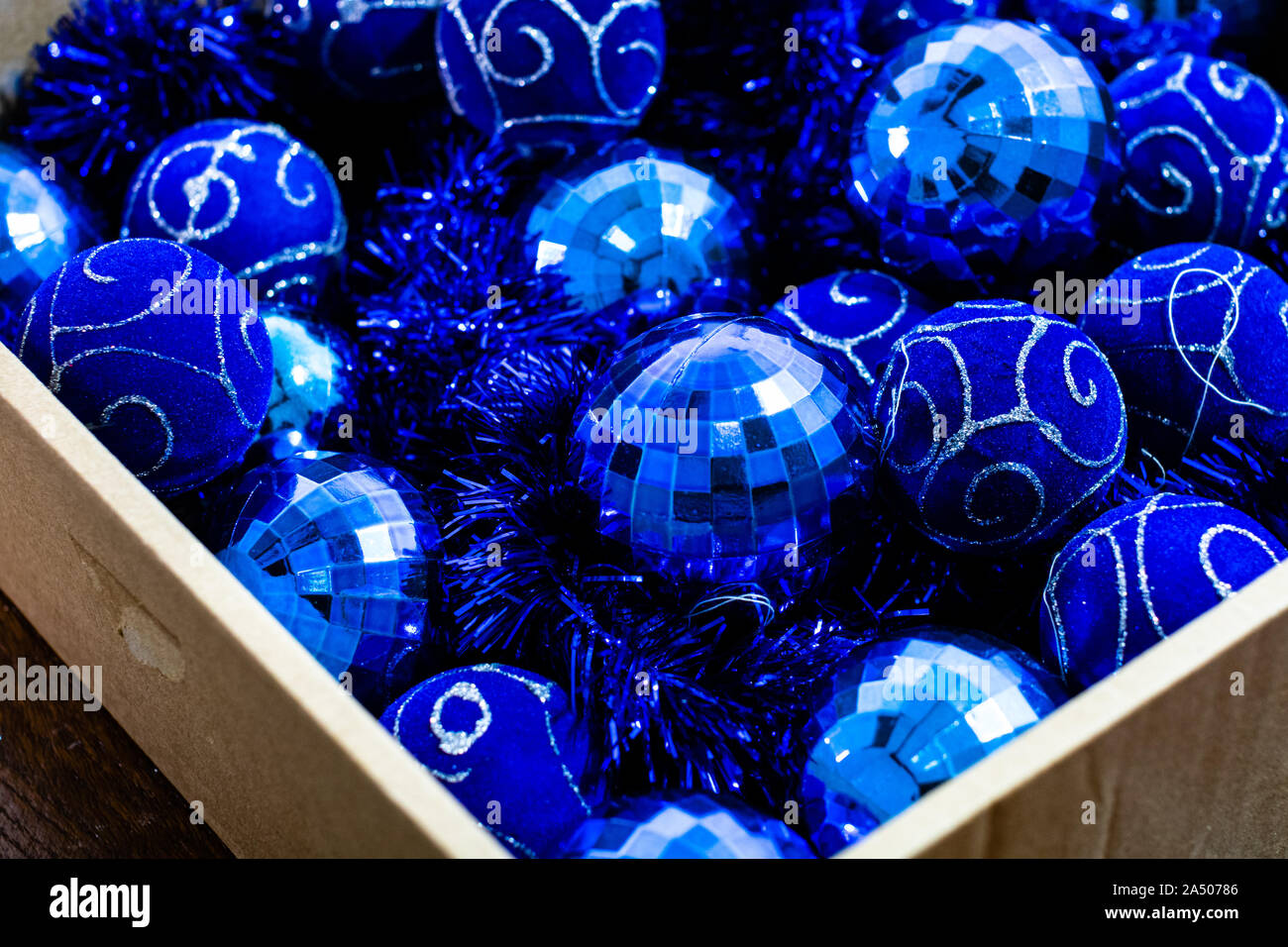 Christmas decorations in a box. Christmas concept. Box with blue ...
