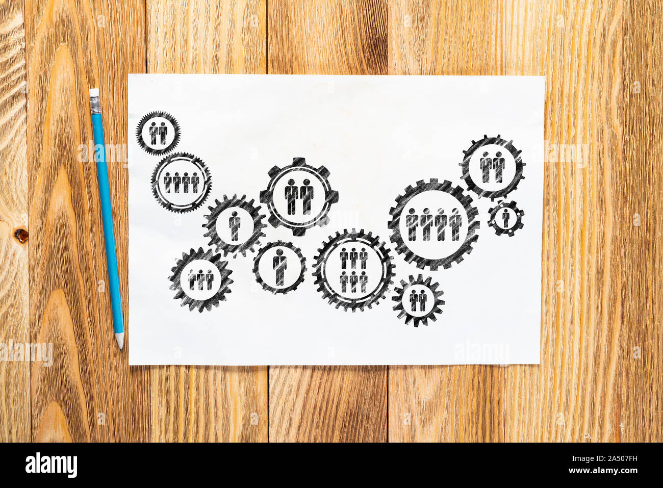 Corporate HR management pencil hand drawn with group of rotating gears ...