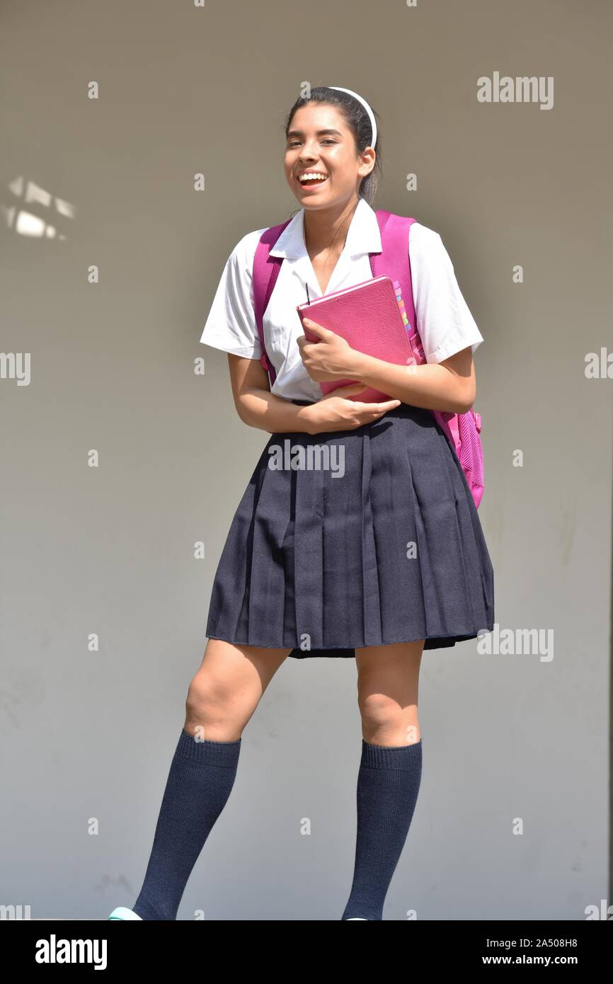 Cute Student Teenager Laughing With Notebook Stock Photo - Alamy