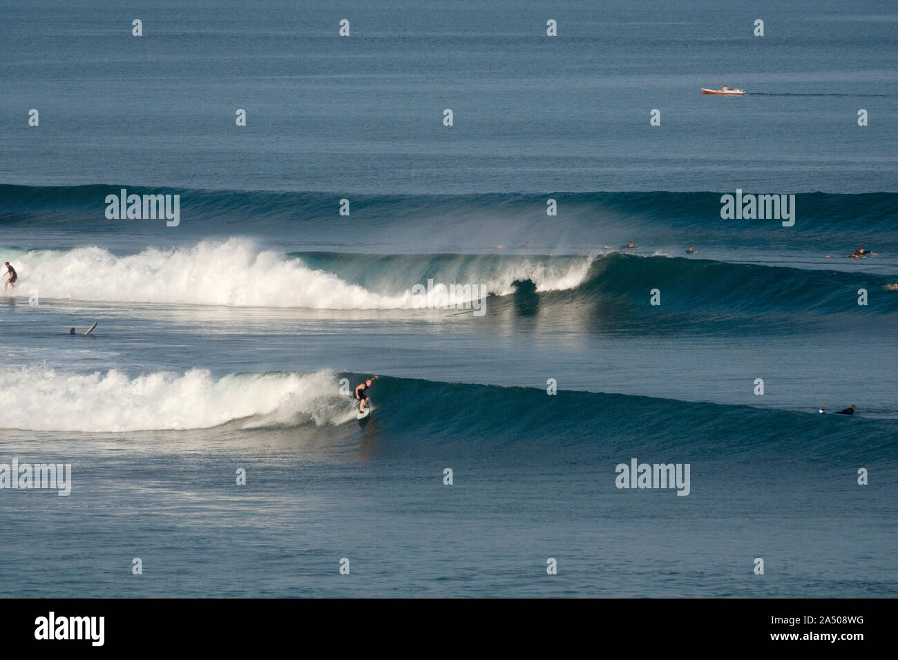 Surfing at Balangan beach in Bali, Indonesia Stock Photo - Alamy