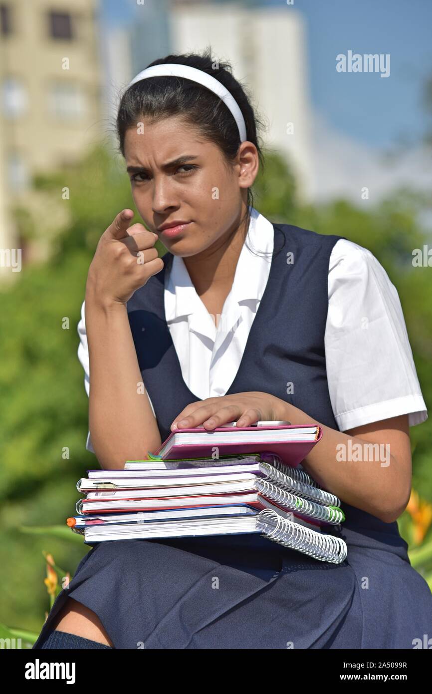 Catholic Colombian Female Student Pointing Stock Photo - Alamy