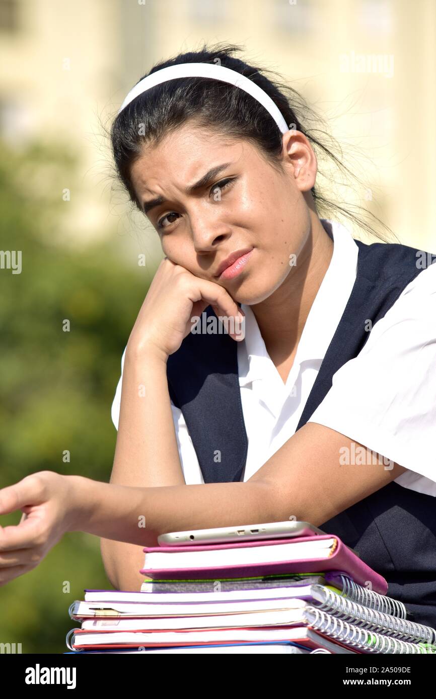 Cute Female Student And Sadness Wearing Uniform Stock Photo - Alamy