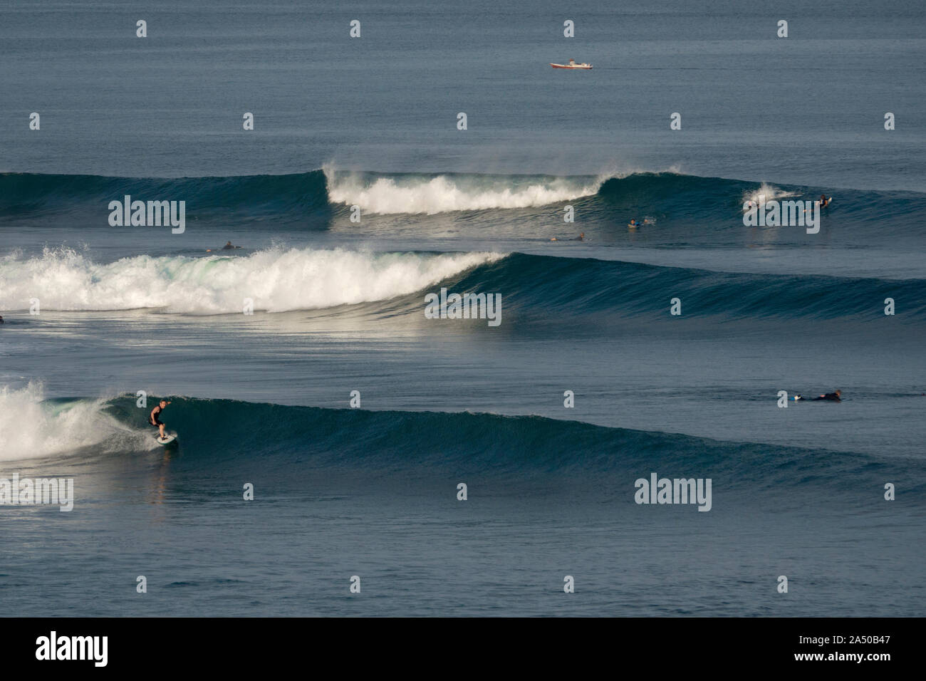 Surfing at Balangan beach in Bali, Indonesia Stock Photo - Alamy