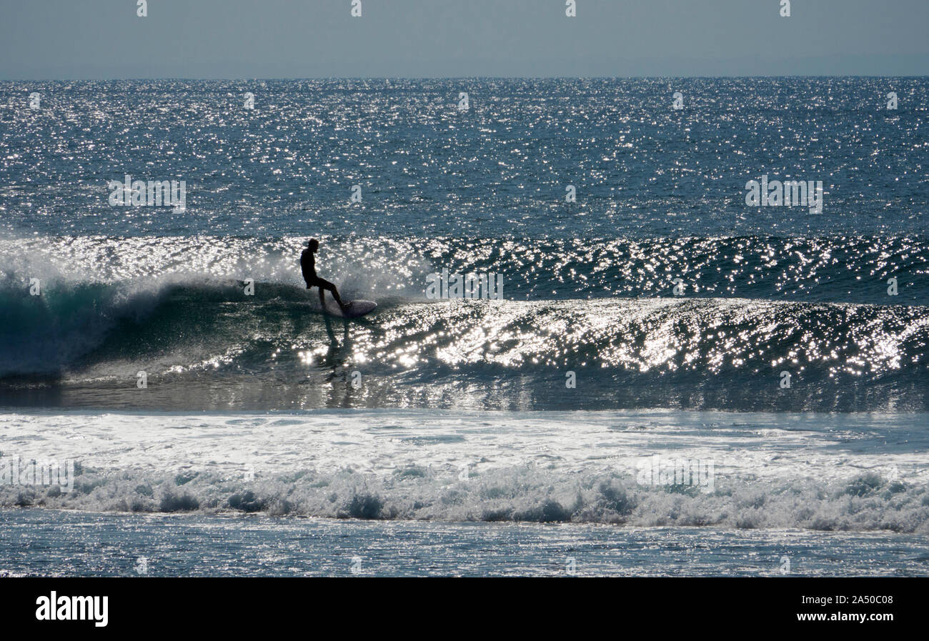 Surfing at Balangan beach in Bali, Indonesia Stock Photo - Alamy