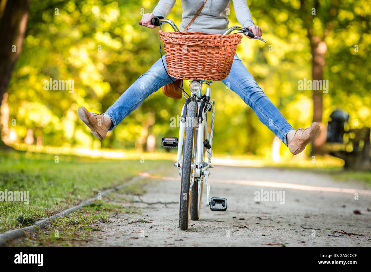 Legs woman riding bike in hi-res stock photography and images - Alamy