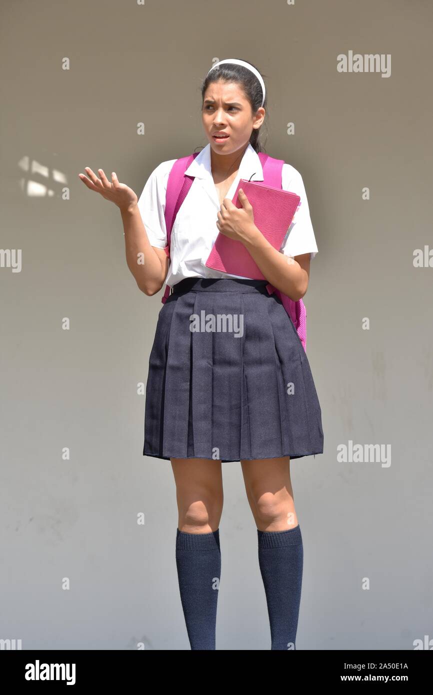 An Undecided Girl Student Wearing Uniform Stock Photo - Alamy